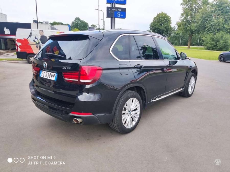 Black BMW X5 2015 in Panevezys, with an engine capacity of 2.00 L and mileage of 273 thousand km for 14900 €, photo 11 on AUTOMOTO.COM.LV