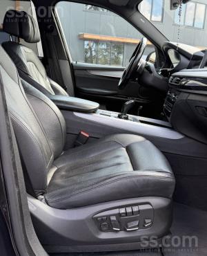 Black BMW X5 2015 in Riga, with an engine capacity of 3.00 L and mileage of 291 thousand km for 25000 €, photo 8 on AUTOMOTO.COM.LV