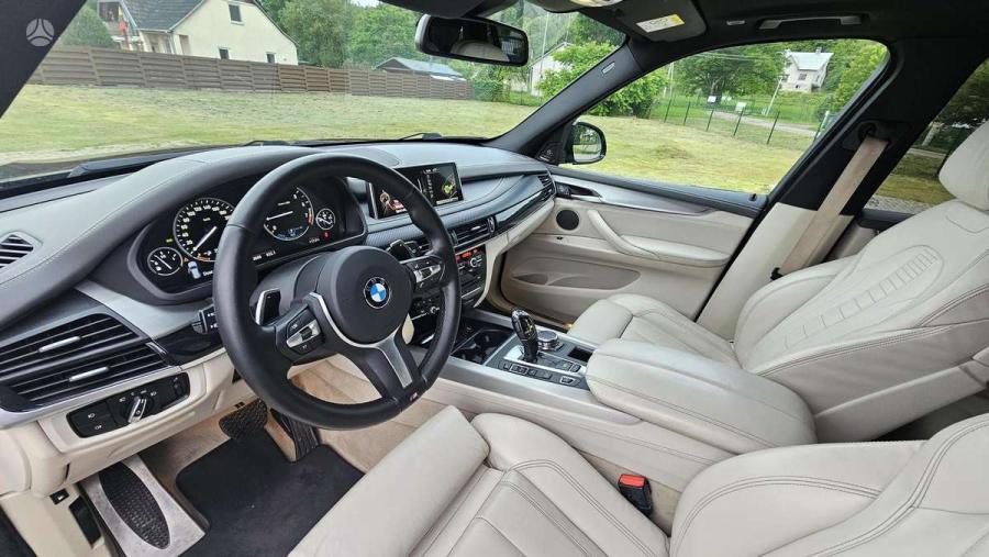 Black BMW X5 2015 in Prienai, with an engine capacity of 2.00 L and mileage of 174 thousand km for 18399 €, photo 13 on AUTOMOTO.COM.LV