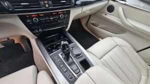 Black BMW X5 2015 in Prienai, with an engine capacity of 2.00 L and mileage of 174 thousand km for 18399 €, photo 17 on AUTOMOTO.COM.LV