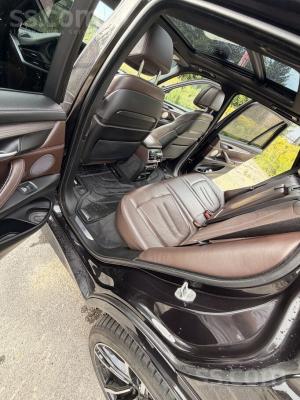 Black BMW X5 2015 in Riga, with an engine capacity of 3.00 L and mileage of 294 thousand km for 23500 €, photo 21 on AUTOMOTO.COM.LV