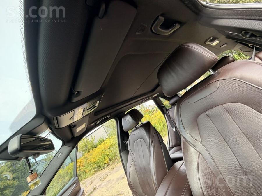 Black BMW X5 2015 in Riga, with an engine capacity of 3.00 L and mileage of 294 thousand km for 23500 €, photo 22 on AUTOMOTO.COM.LV