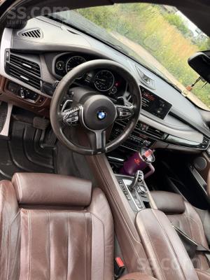 Black BMW X5 2015 in Riga, with an engine capacity of 3.00 L and mileage of 294 thousand km for 23500 €, photo 25 on AUTOMOTO.COM.LV