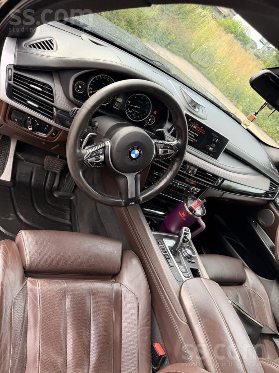 Black BMW X5 2015 in Riga, with an engine capacity of 3.00 L and mileage of 294 thousand km for 23500 €, photo 25 on AUTOMOTO.COM.LV