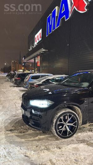 Black BMW X5 2015 in Riga, with an engine capacity of 3.00 L and mileage of 294 thousand km for 23500 €, photo 26 on AUTOMOTO.COM.LV