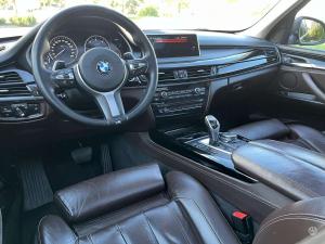 Black BMW X5 2015 in Alytus, with an engine capacity of 2.99 L and mileage of 288 thousand km for 15850 €, photo 22 on AUTOMOTO.COM.LV