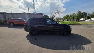 Black BMW X5 2015 in Riga, with an engine capacity of 3.00 L and mileage of 281 thousand km for 17990 €, photo 10 on AUTOMOTO.COM.LV