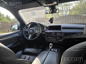 Black BMW X5 2015 in Preili, with an engine capacity of 3.00 L and mileage of 126 thousand km for 28500 €, photo 6 on AUTOMOTO.COM.LV