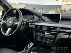 Black BMW X5 2015 in Riga, with an engine capacity of 3.00 L and mileage of 254 thousand km for 21900 €, photo 10 on AUTOMOTO.COM.LV