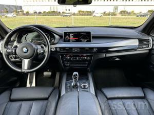 Black BMW X5 2015 in Riga, with an engine capacity of 3.00 L and mileage of 254 thousand km for 21900 €, photo 12 on AUTOMOTO.COM.LV
