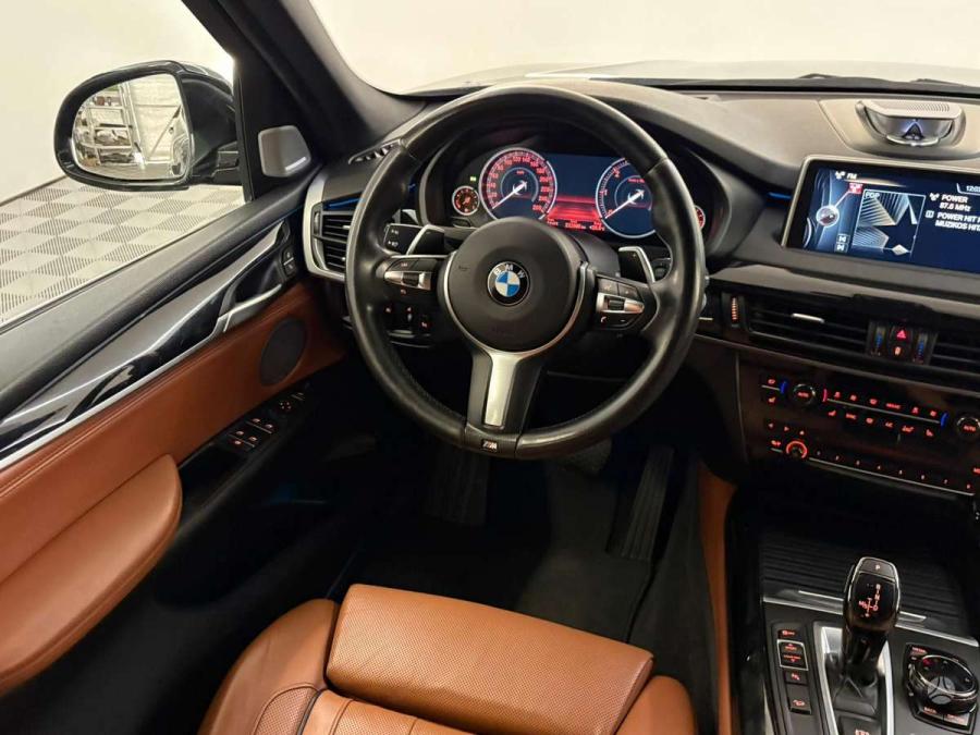 Black BMW X5 2015 in Marijampole, with an engine capacity of 2.99 L and mileage of 233 thousand km for 20999 €, photo 25 on AUTOMOTO.COM.LV