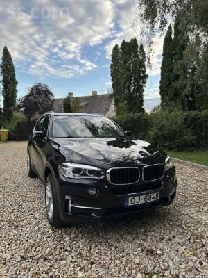 Black BMW X5 2015 in Riga, with an engine capacity of 3.00 L and mileage of 240 thousand km for 16800 €, photo  on AUTOMOTO.COM.LV