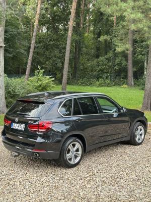 Black BMW X5 2015 in Riga, with an engine capacity of 3.00 L and mileage of 240 thousand km for 16800 €, photo 5 on AUTOMOTO.COM.LV