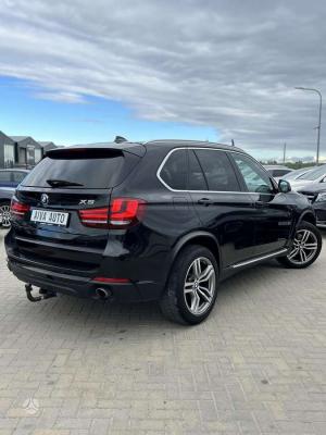 Black BMW X5 2015 in Kaunas, with an engine capacity of 2.00 L and mileage of 332 thousand km for 14600 €, photo 9 on AUTOMOTO.COM.LV