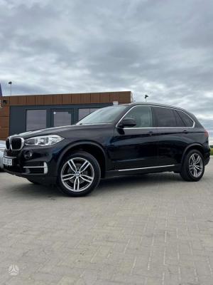 Black BMW X5 2015 in Kaunas, with an engine capacity of 2.00 L and mileage of 332 thousand km for 14600 €, photo 13 on AUTOMOTO.COM.LV