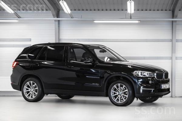 Black BMW X5 2015 in Tukums, with an engine capacity of 3.00 L and mileage of 200 thousand km for 16400 €, photo 6 on AUTOMOTO.COM.LV