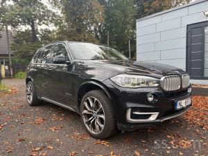 Black BMW X5 2015 in Riga, with an engine capacity of 3.00 L and mileage of 0 thousand km for 15650 €, photo 3 on AUTOMOTO.COM.LV