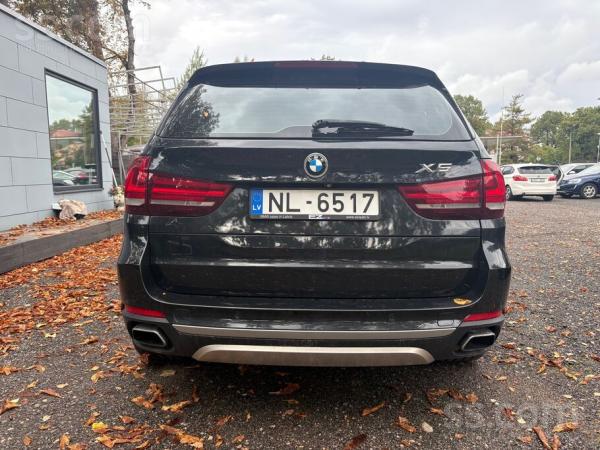 Black BMW X5 2015 in Riga, with an engine capacity of 3.00 L and mileage of 0 thousand km for 15650 €, photo 4 on AUTOMOTO.COM.LV