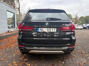 Black BMW X5 2015 in Riga, with an engine capacity of 3.00 L and mileage of 0 thousand km for 15650 €, photo 4 on AUTOMOTO.COM.LV