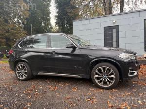 Black BMW X5 2015 in Riga, with an engine capacity of 3.00 L and mileage of 0 thousand km for 15650 €, photo 5 on AUTOMOTO.COM.LV