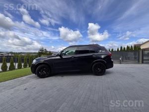 Black BMW X5 2015 in Riga, with an engine capacity of 3.00 L and mileage of 234 thousand km for 21000 €, photo  on AUTOMOTO.COM.LV