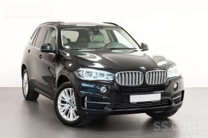 Black BMW X5 2015 in Riga, with an engine capacity of 3.00 L and mileage of 232 thousand km for 28400 €, photo 3 on AUTOMOTO.COM.LV