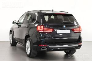 Black BMW X5 2015 in Riga, with an engine capacity of 3.00 L and mileage of 232 thousand km for 28400 €, photo 4 on AUTOMOTO.COM.LV