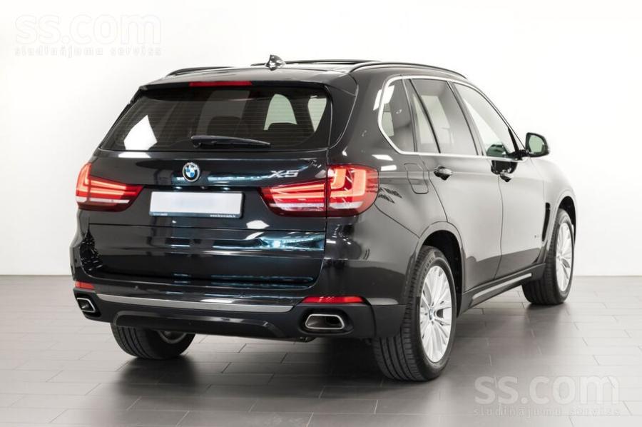 Black BMW X5 2015 in Riga, with an engine capacity of 3.00 L and mileage of 232 thousand km for 28400 €, photo 5 on AUTOMOTO.COM.LV