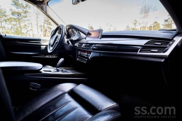 Black BMW X5 2015 in Riga, with an engine capacity of 3.00 L and mileage of 325 thousand km for 15490 €, photo 11 on AUTOMOTO.COM.LV