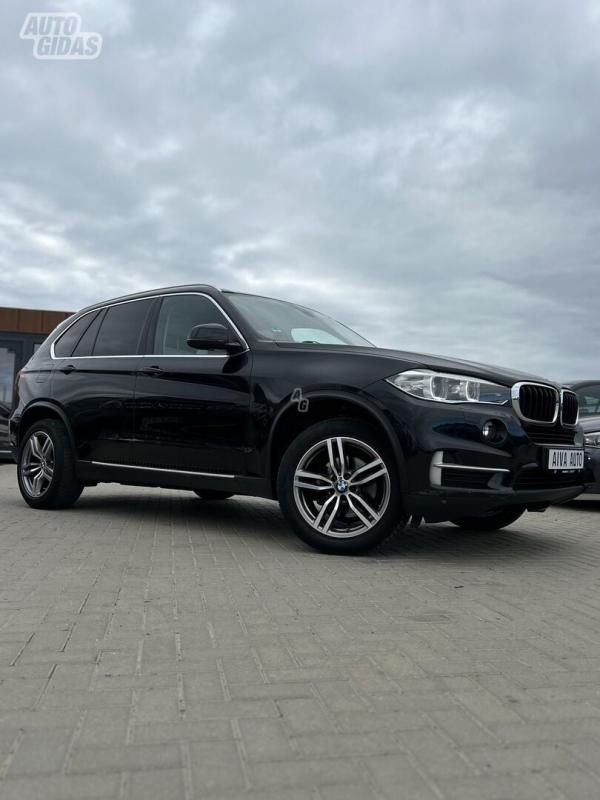 Black BMW X5 2015 in Kaunas, with an engine capacity of 2.00 L and mileage of 332 thousand km for 14300 €, photo 7 on AUTOMOTO.COM.LV