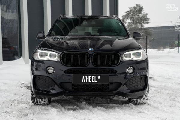 Black BMW X5 2016 in Vilnius, with an engine capacity of 3.00 L and mileage of 170 thousand km for 22690 €, photo 8 on AUTOMOTO.COM.LV