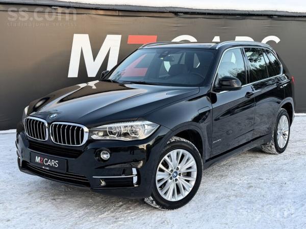 Black BMW X5 2016 in Riga, with an engine capacity of 2.00 L and mileage of 123 thousand km for 23990 €, photo 1 on AUTOMOTO.COM.LV