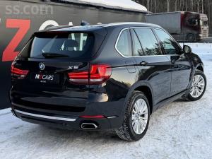 Black BMW X5 2016 in Riga, with an engine capacity of 2.00 L and mileage of 123 thousand km for 23990 €, photo 3 on AUTOMOTO.COM.LV