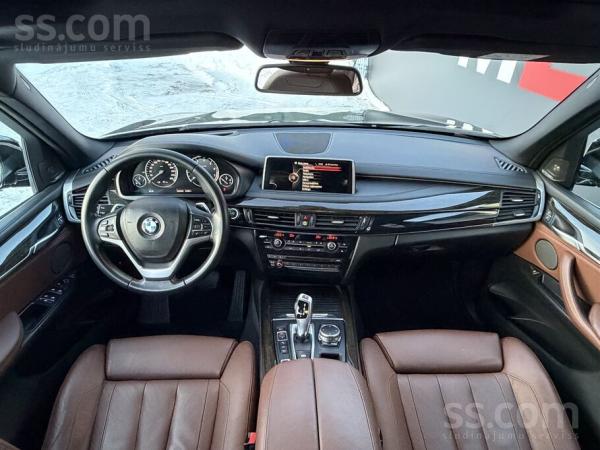 Black BMW X5 2016 in Riga, with an engine capacity of 2.00 L and mileage of 123 thousand km for 23990 €, photo 5 on AUTOMOTO.COM.LV