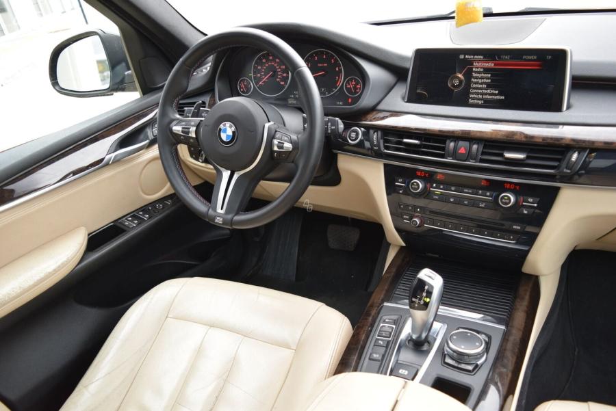 Black BMW X5 2016 in Vilnius, with an engine capacity of 3.00 L and mileage of 298 thousand km for 14750 €, photo 14 on AUTOMOTO.COM.LV