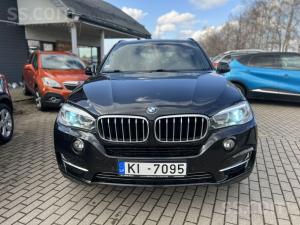 Black BMW X5 2016 in Talsi, with an engine capacity of 3.00 L and mileage of 214 thousand km for 29970 €, photo 4 on AUTOMOTO.COM.LV