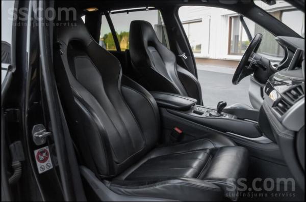 Black BMW X5 2016 in Riga, with an engine capacity of 4.40 L and mileage of 202 thousand km for 29500 €, photo 7 on AUTOMOTO.COM.LV