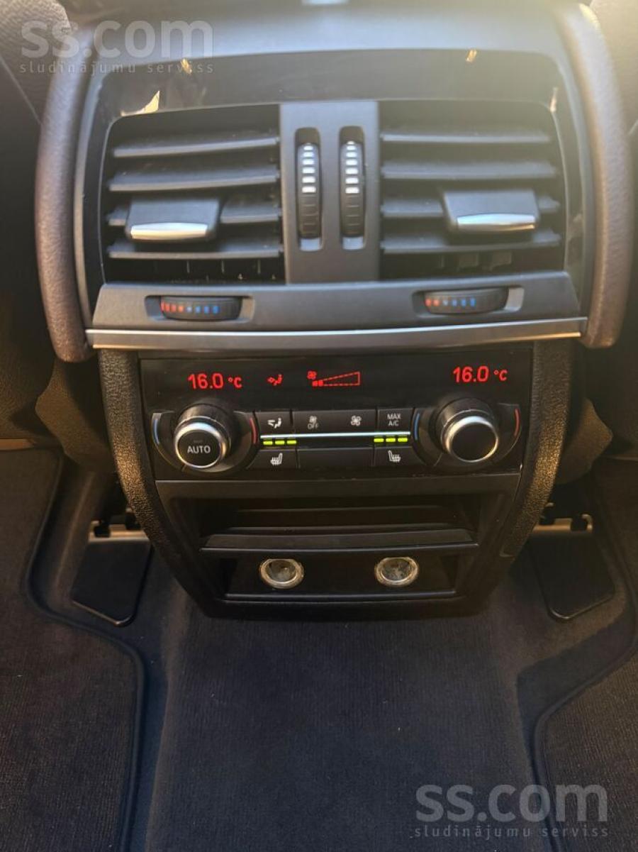 Black BMW X5 2016 in Riga, with an engine capacity of 3.00 L and mileage of 198 thousand km for 19000 €, photo 18 on AUTOMOTO.COM.LV