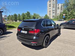 Black BMW X5 2016 in Riga, with an engine capacity of 2.00 L and mileage of 226 thousand km for 18990 €, photo 7 on AUTOMOTO.COM.LV