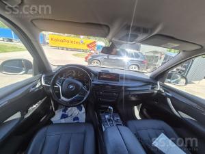 Black BMW X5 2016 in Riga, with an engine capacity of 2.00 L and mileage of 226 thousand km for 18990 €, photo 12 on AUTOMOTO.COM.LV
