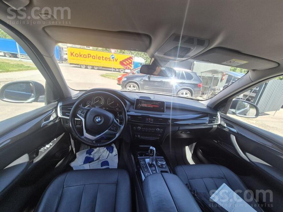 Black BMW X5 2016 in Riga, with an engine capacity of 2.00 L and mileage of 226 thousand km for 18990 €, photo 12 on AUTOMOTO.COM.LV