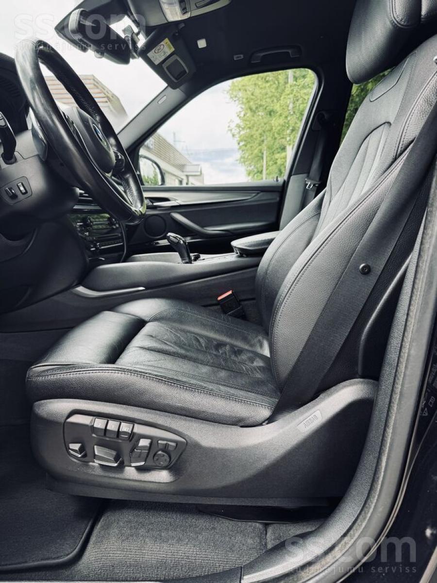 Black BMW X5 2016 in Liepaja, with an engine capacity of 4.00 L and mileage of 178 thousand km for 25500 €, photo 6 on AUTOMOTO.COM.LV