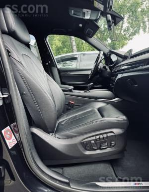 Black BMW X5 2016 in Liepaja, with an engine capacity of 4.00 L and mileage of 178 thousand km for 25500 €, photo 7 on AUTOMOTO.COM.LV