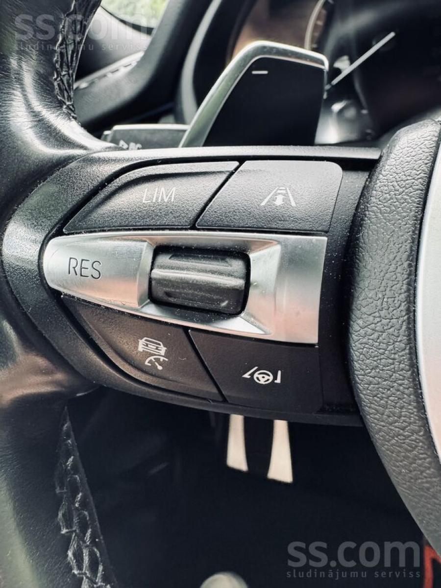 Black BMW X5 2016 in Liepaja, with an engine capacity of 4.00 L and mileage of 178 thousand km for 25500 €, photo 13 on AUTOMOTO.COM.LV