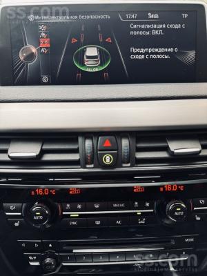 Black BMW X5 2016 in Liepaja, with an engine capacity of 4.00 L and mileage of 178 thousand km for 25500 €, photo 19 on AUTOMOTO.COM.LV