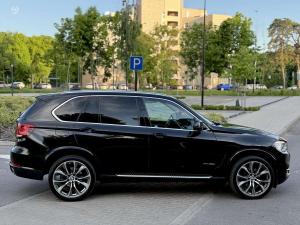 Black BMW X5 2016 in Vilnius, with an engine capacity of 2.99 L and mileage of 189 thousand km for 18500 €, photo 7 on AUTOMOTO.COM.LV