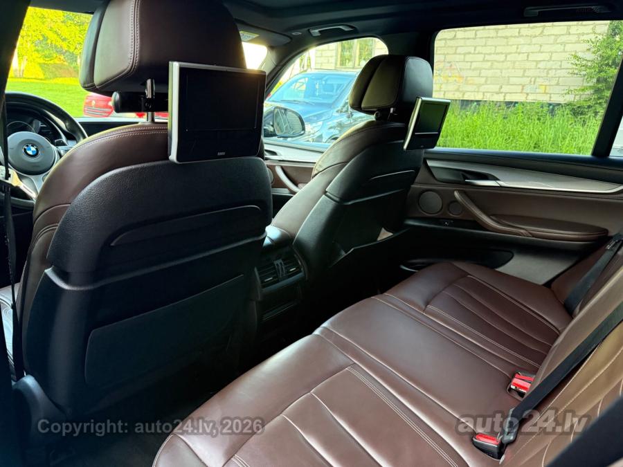 Black BMW X5 2016 in Tallinn, with an engine capacity of 3.00 L and mileage of 199 thousand km for 29900 €, photo 7 on AUTOMOTO.COM.LV