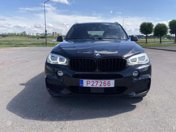 Black BMW X5 2016 in Kaunas, with an engine capacity of 4.40 L and mileage of 220 thousand km for 13950 €, photo 7 on AUTOMOTO.COM.LV