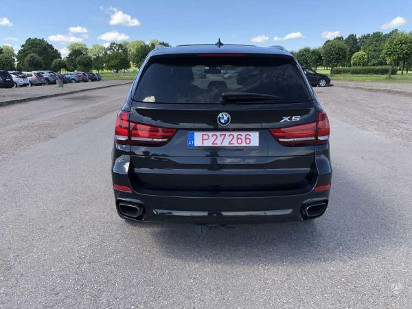 Black BMW X5 2016 in Kaunas, with an engine capacity of 4.40 L and mileage of 220 thousand km for 13950 €, photo 8 on AUTOMOTO.COM.LV