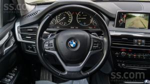 Black BMW X5 2016 in Riga, with an engine capacity of 2.00 L and mileage of 226 thousand km for 18990 €, photo 15 on AUTOMOTO.COM.LV